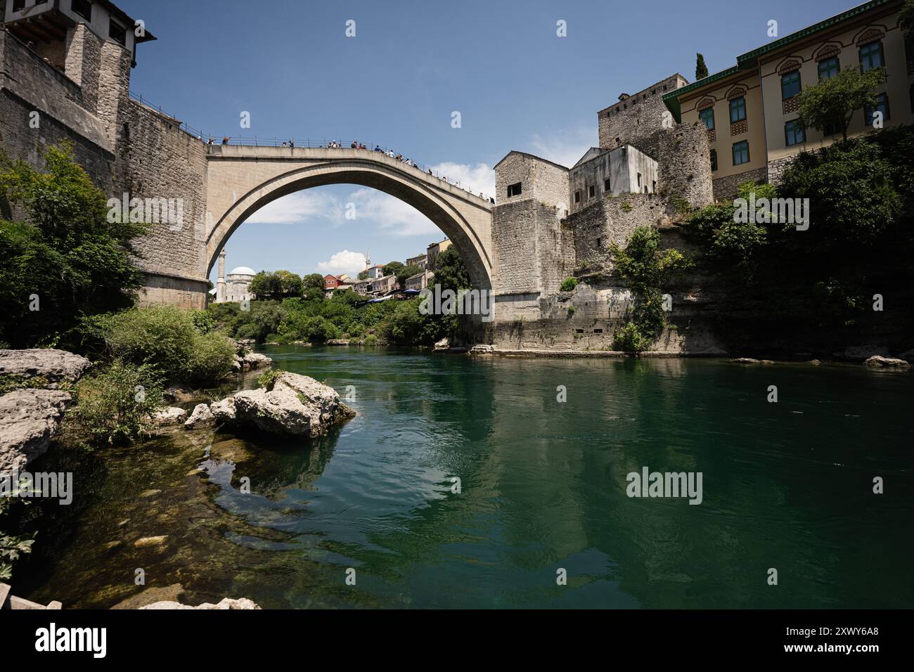 The iconic Stari Most bridge in Mostar, Bosnia, stretches over the ...