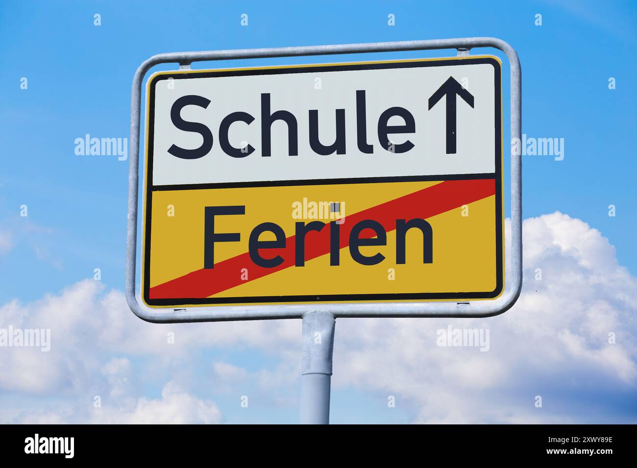 School start symbol: German town exit sign with the terms HOLIDAYS and ...