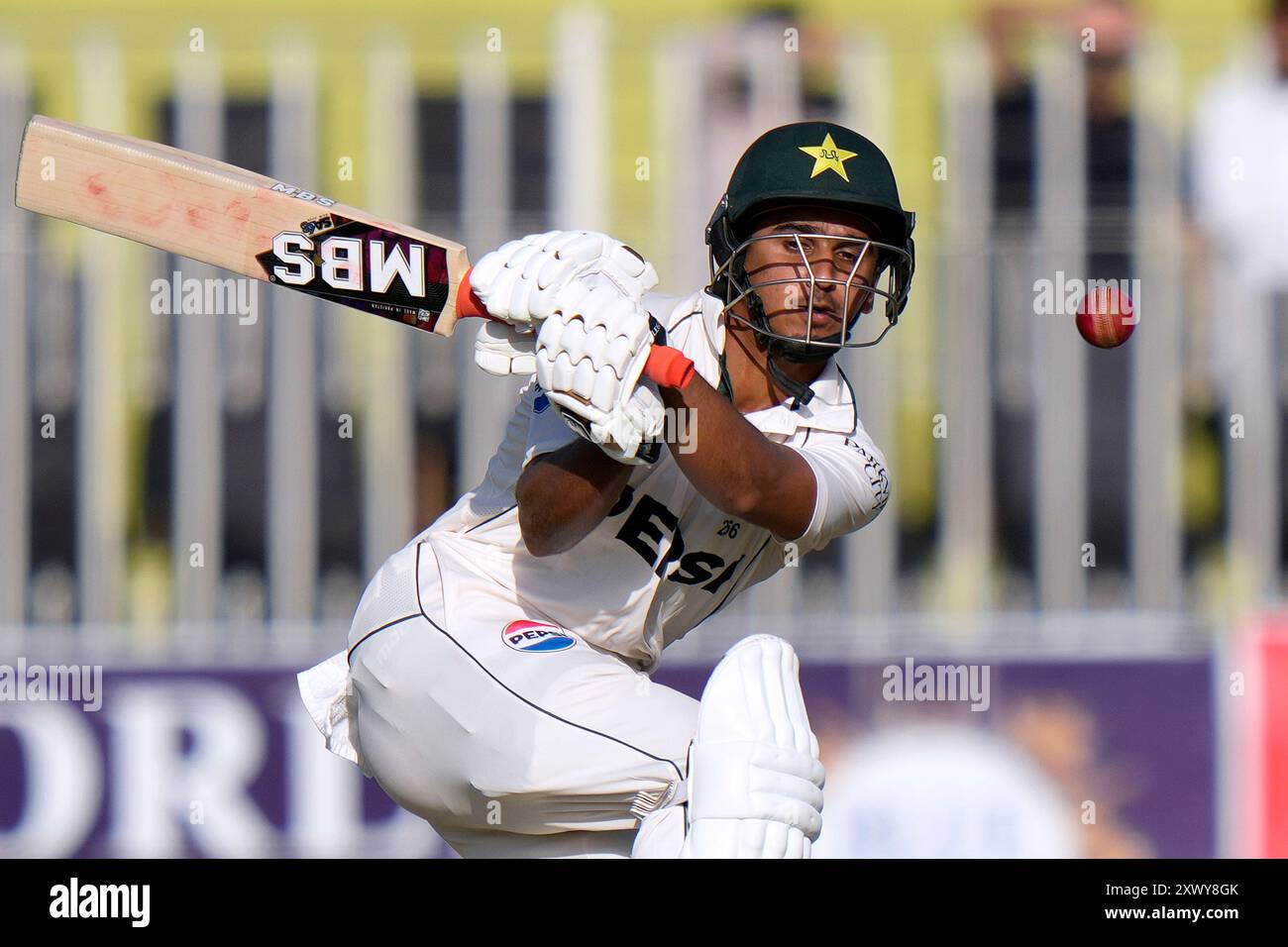 Pakistan's Saim Ayub plays a shot during the first day of first cricket ...