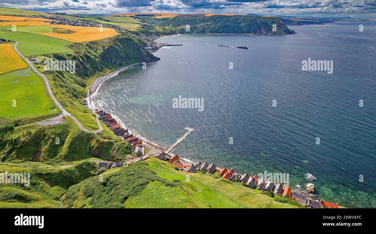 Crovie Aberdeenshire Scotland golden barley fields and rain clouds in ...