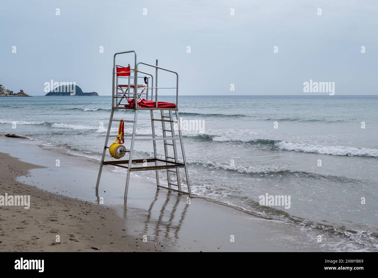 An empty elevated lifeguard chair on the beach of Alassio in the ...
