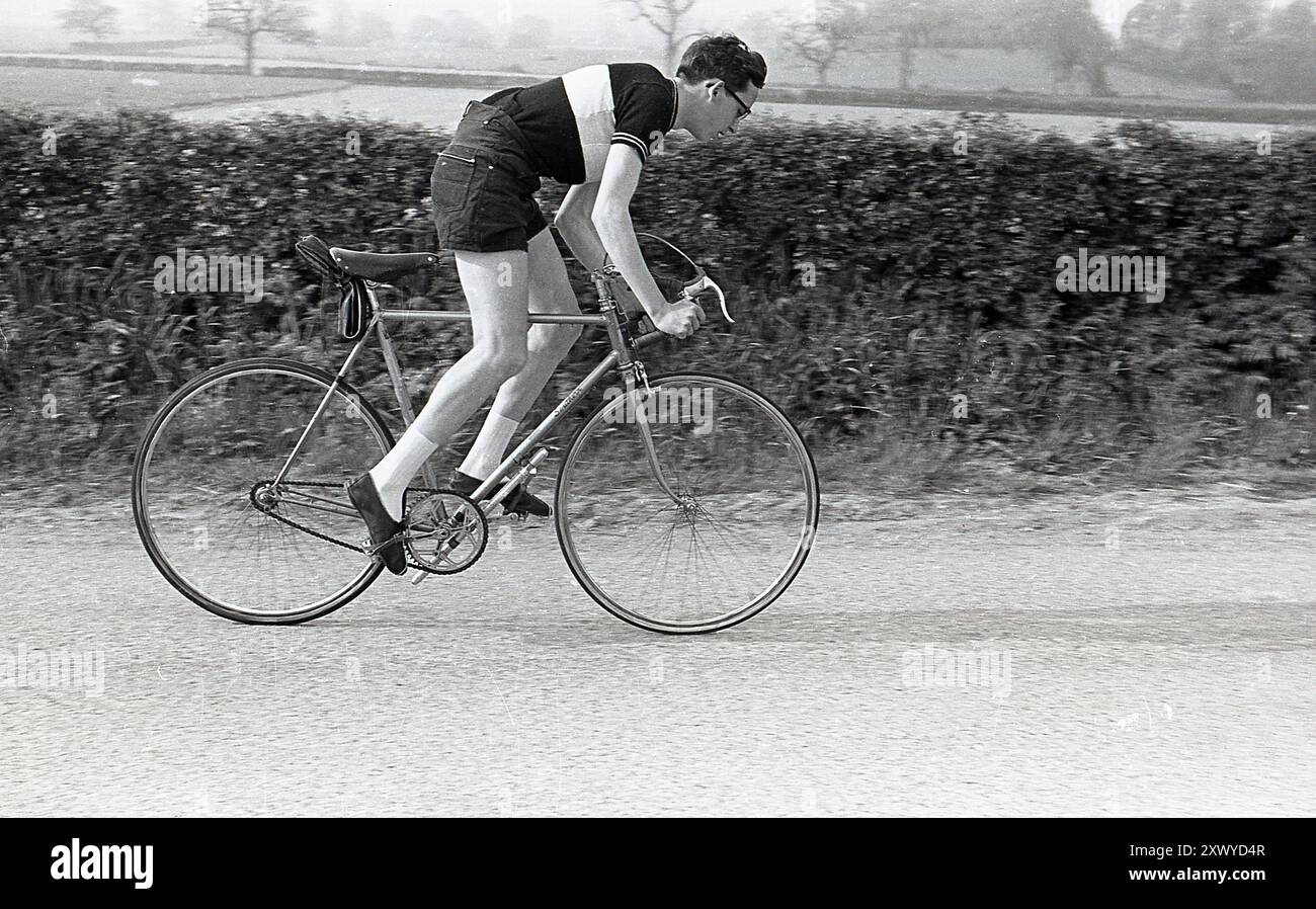 1960s, historical, young man male cyclist on road, spare inner for tyre ...