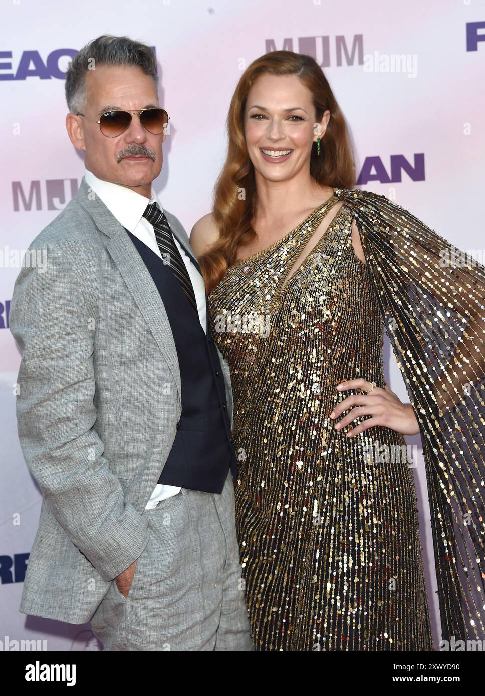 Hollywood, USA. 20th Aug, 2024. Adrian Pasdar, Amanda Rhigetti arriving ...