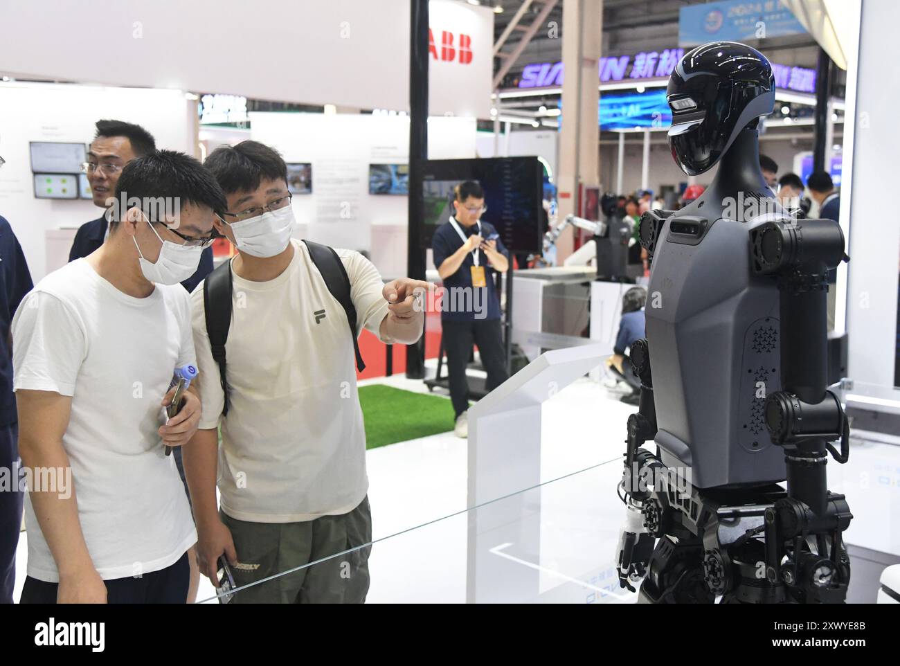 Beijing, China. 21st Aug, 2024. People visit the World Robot Conference ...