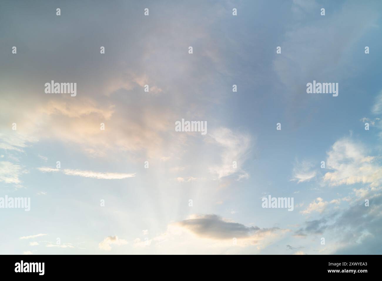 Beautiful summer morning sky with lighting clouds and sun rays. Copy ...