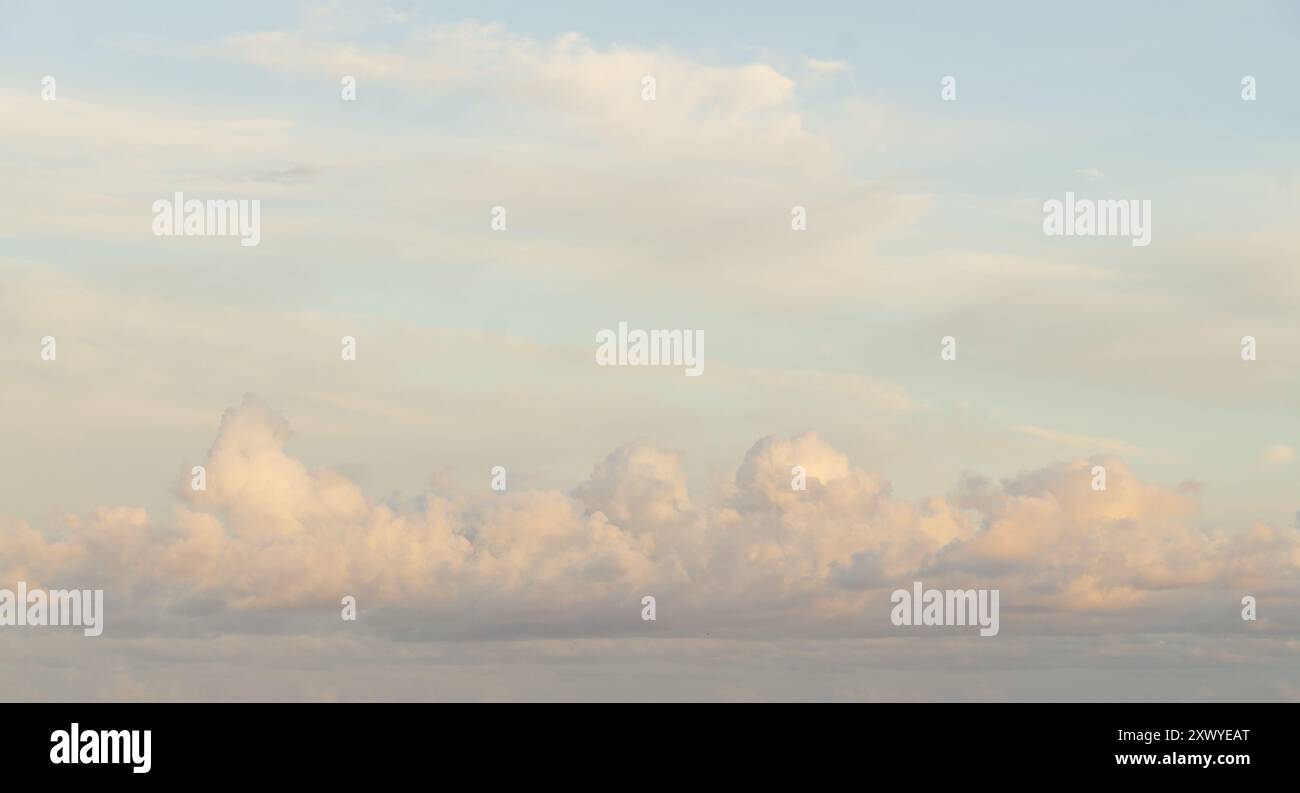 Pastel pale and blue foggy cloudy sky wallpaper. Copy space background ...