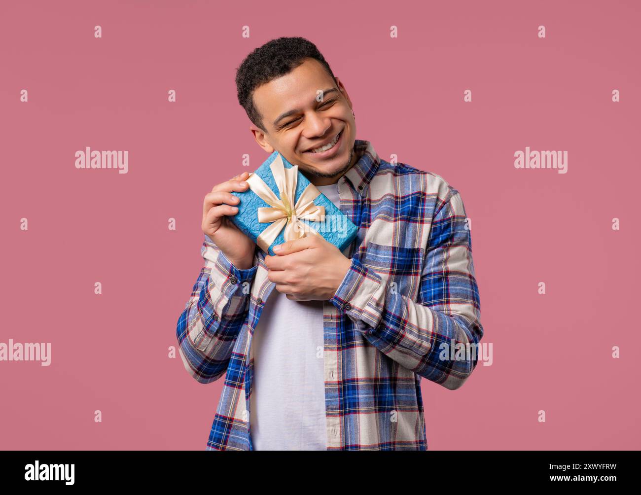 Excited Man Hold Gift Box With Bow. He Is Happy And Flattered By ...