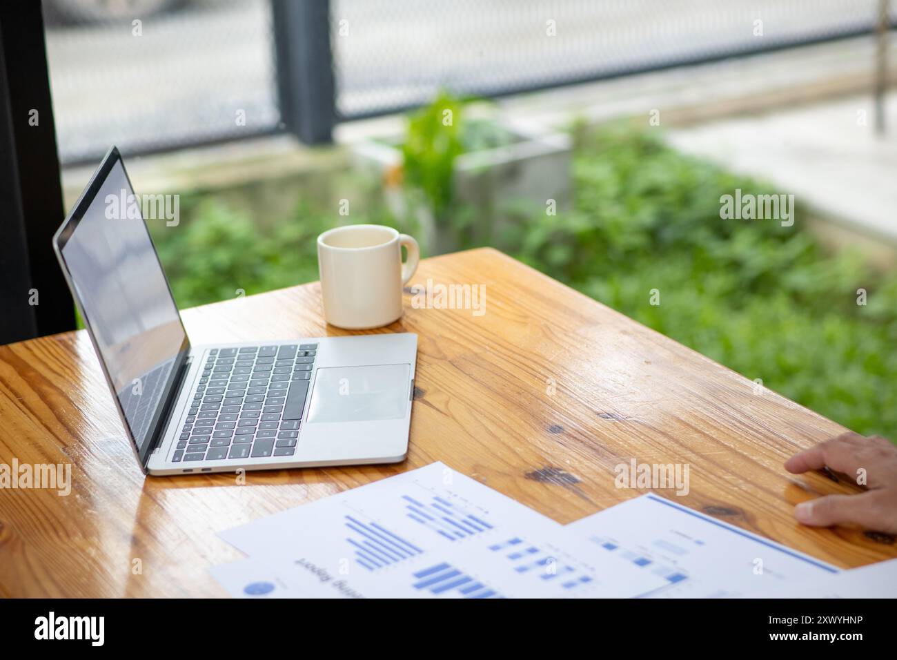desk full of documents and tools for work in a businessman's office is ...