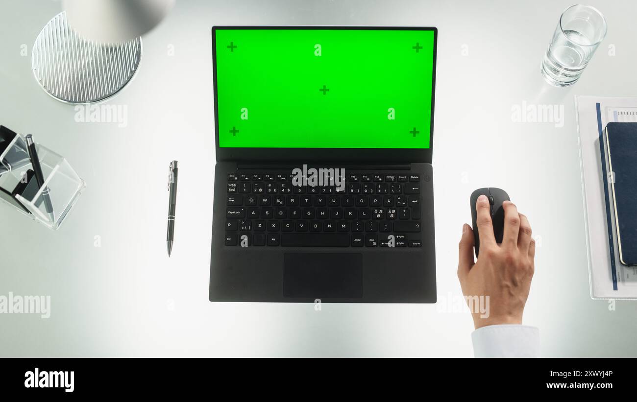 Anonymous Corporate Employee Using Laptop Computer with Mock Up Green ...