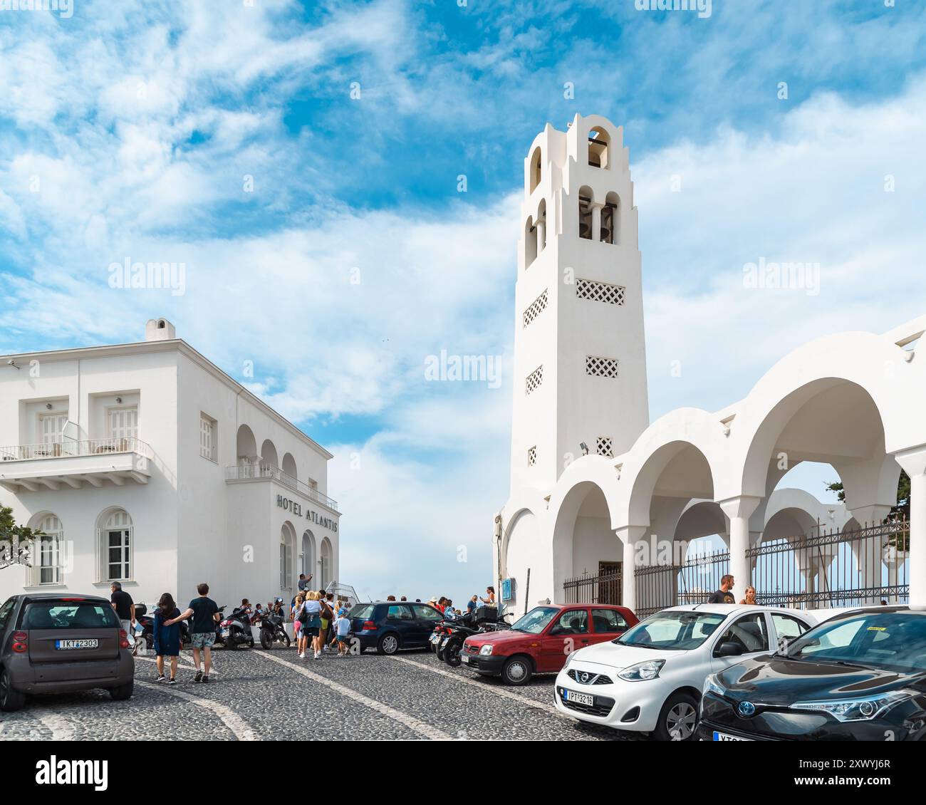 Santorini, Greece - October 8, 2019: A bustling street scene under the ...