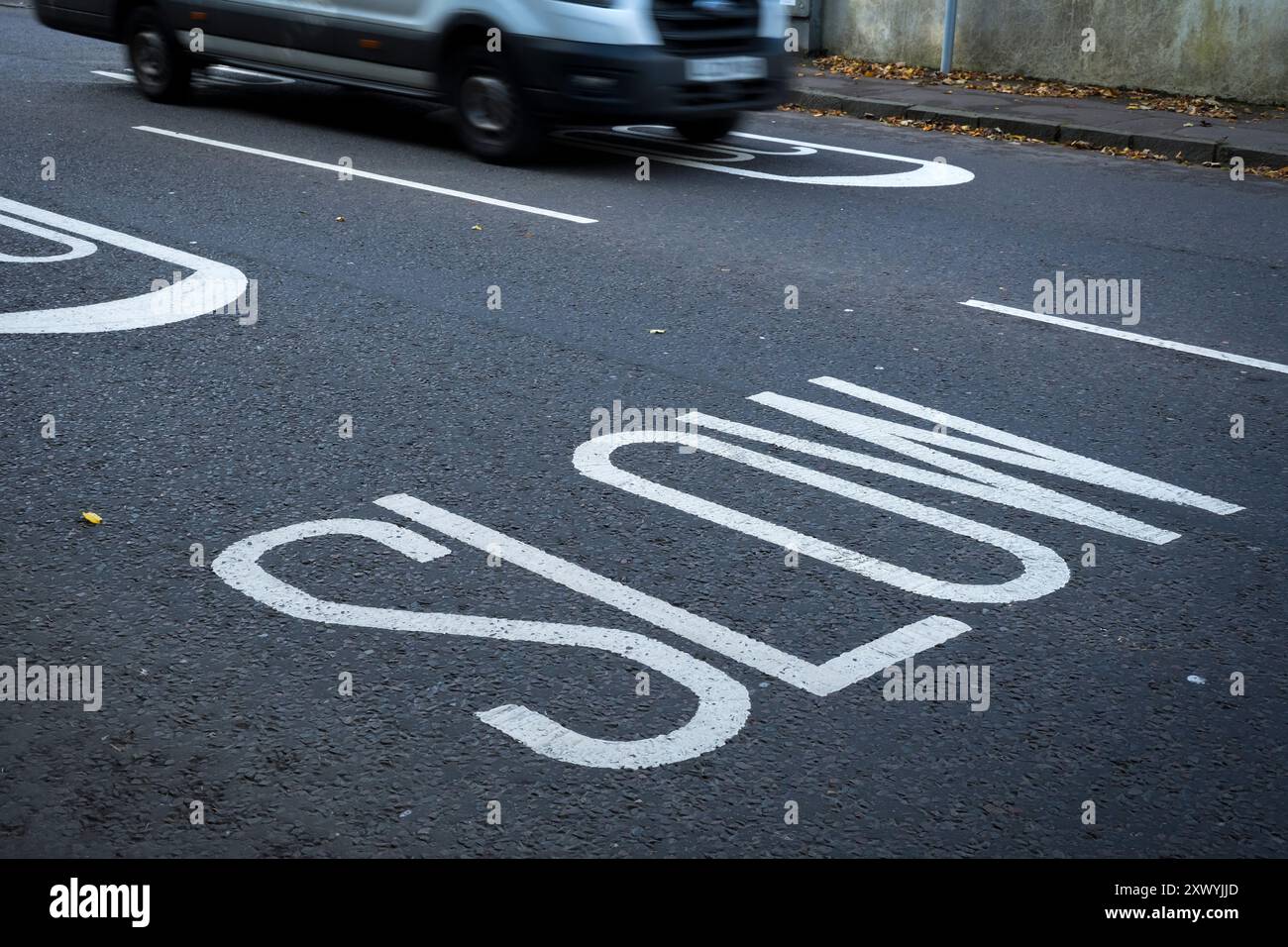 Slow down speed on 30 Stock Photo - Alamy