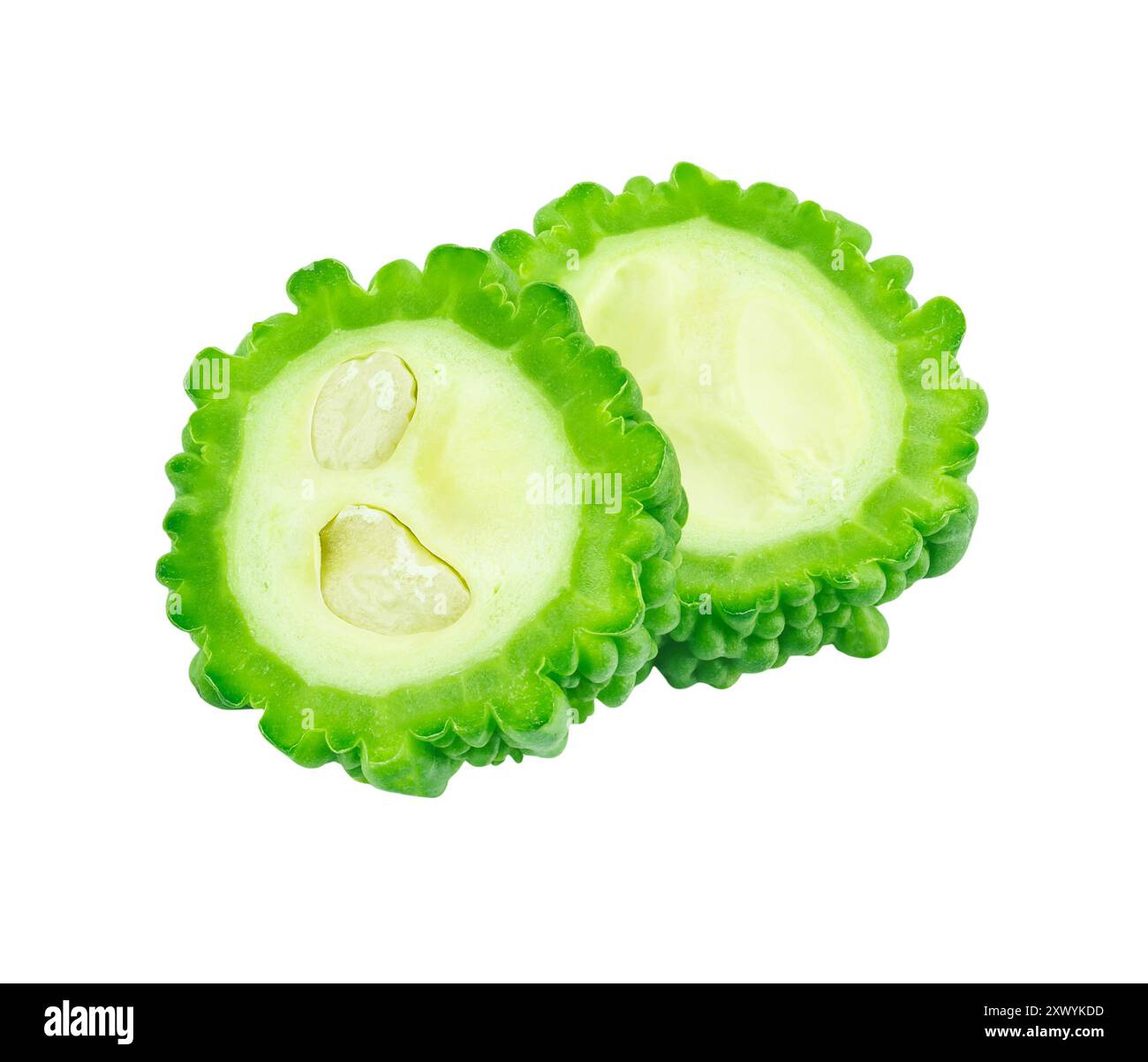 slices of bitter gourd arranged on white background Stock Photo - Alamy