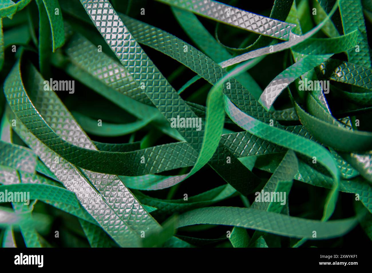 Plastic strips of an artificial hedge. Abstract background. Abstract ...