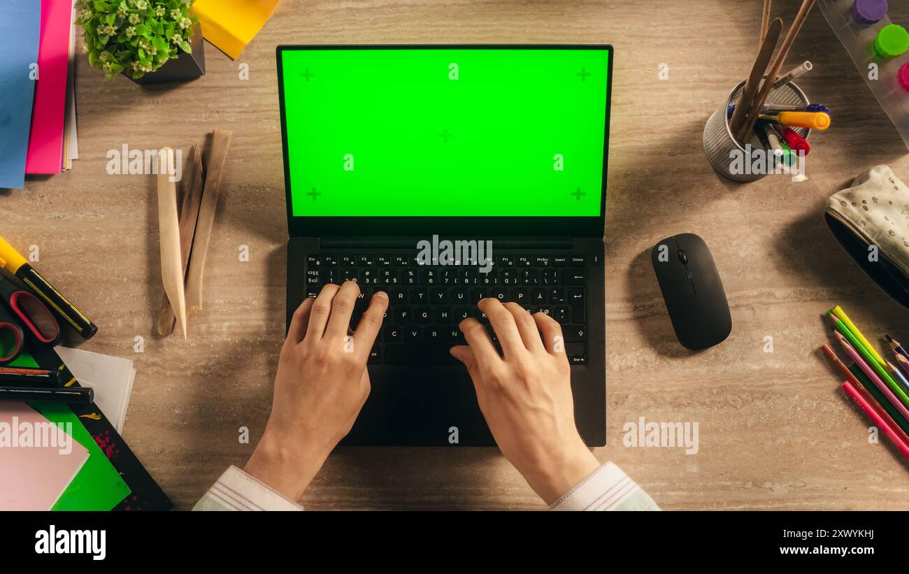 Anonymous Designer Typing on a Laptop with Mock Up Green Screen ...