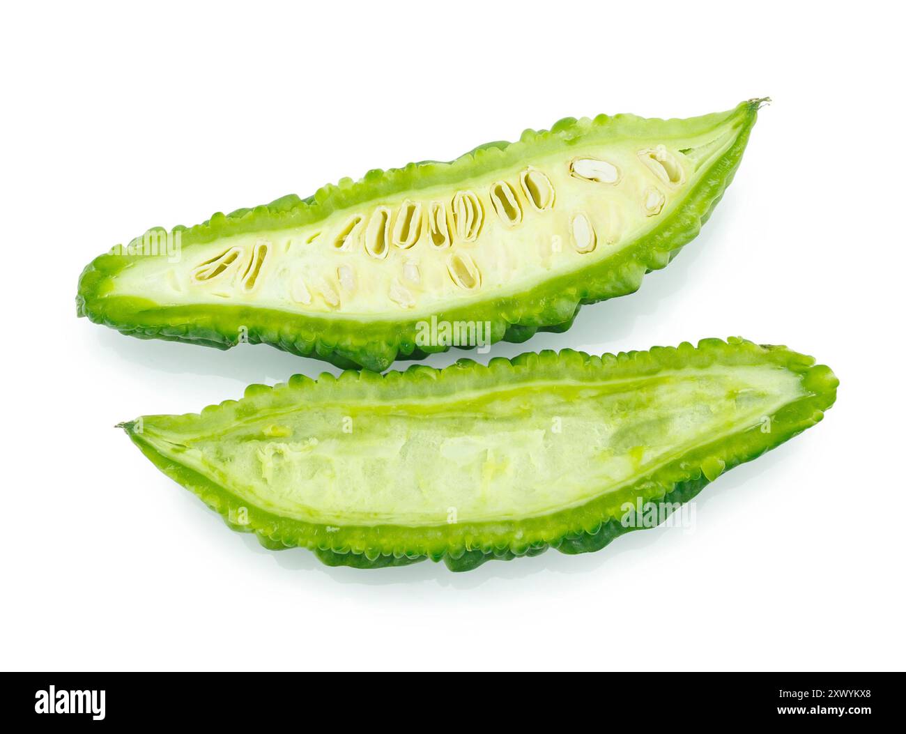 slices of bitter gourd arranged on white background Stock Photo - Alamy