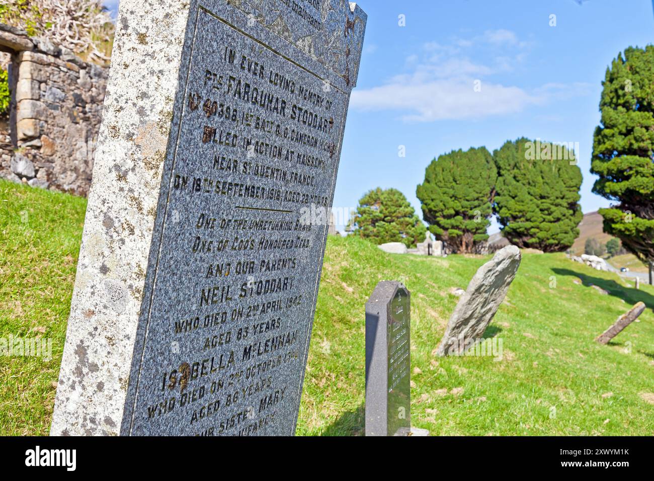 Picture of an old gravestone in a historic cemetery on the Isle of Skye ...