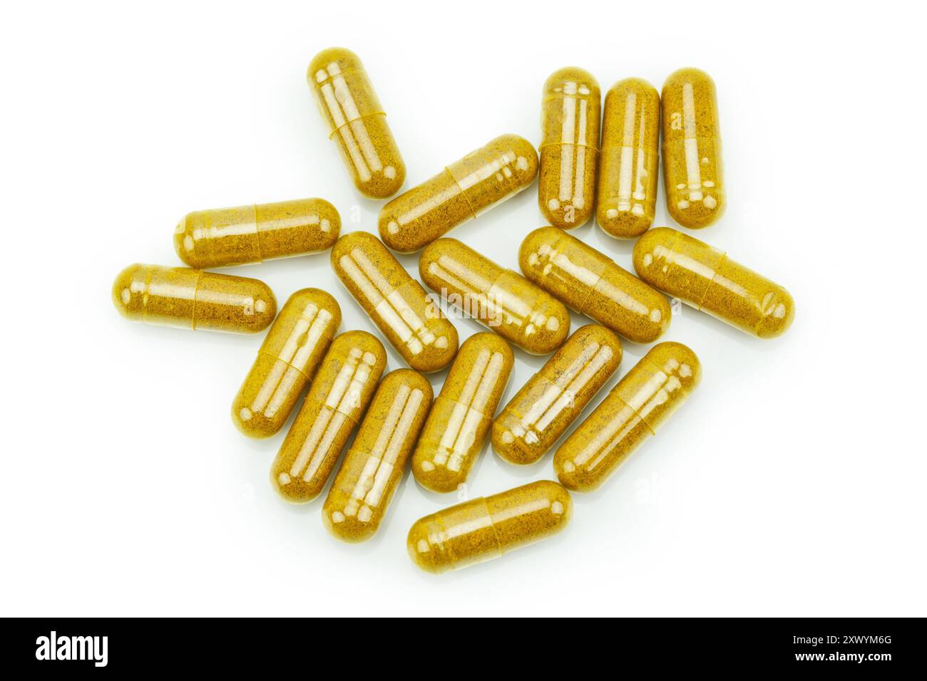 Turmeric capsule powder on white background Stock Photo - Alamy