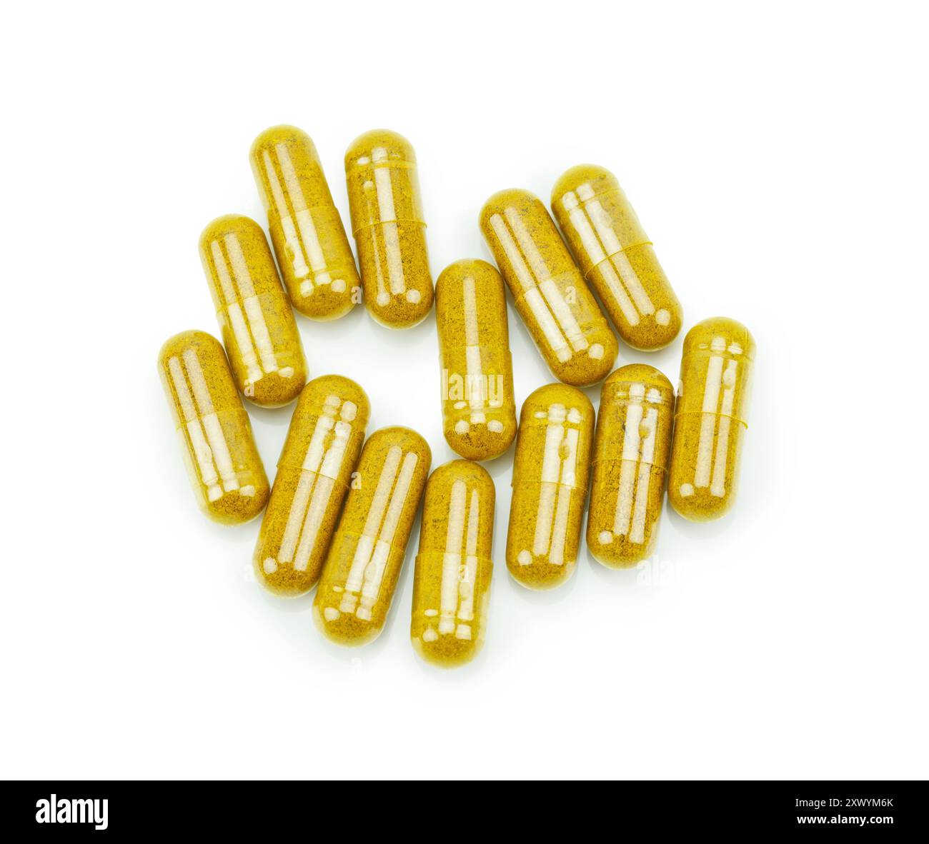 Turmeric capsule powder on white background Stock Photo - Alamy