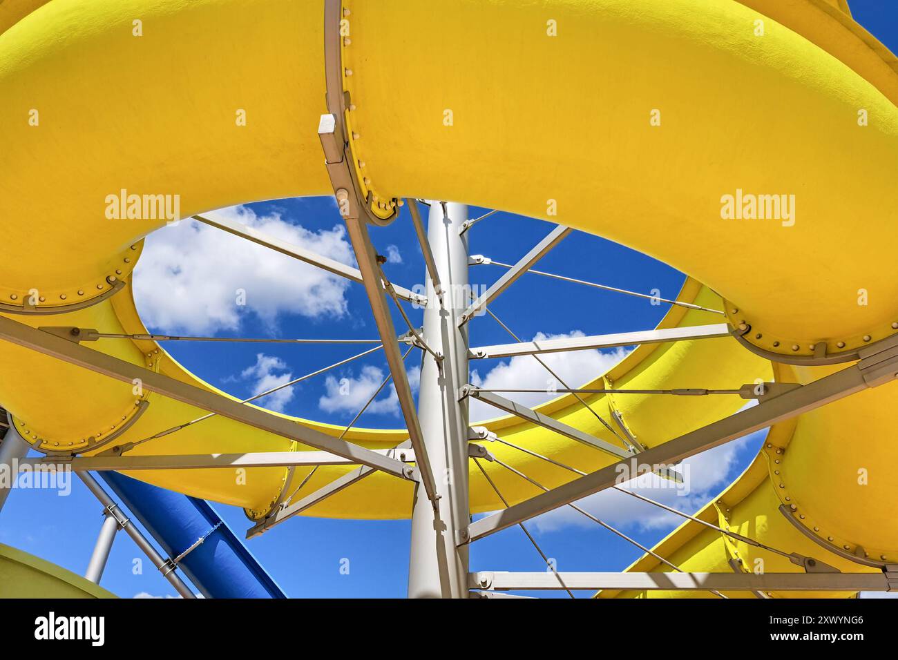 Yellow slide in a water park against the sky. Summer vacation Stock ...
