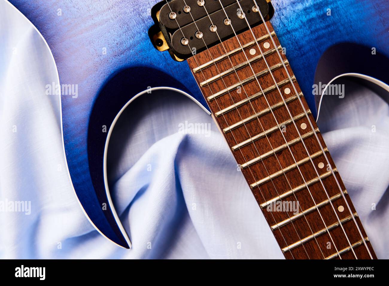 Fretboard of modern electric guitar. Close up Stock Photo - Alamy