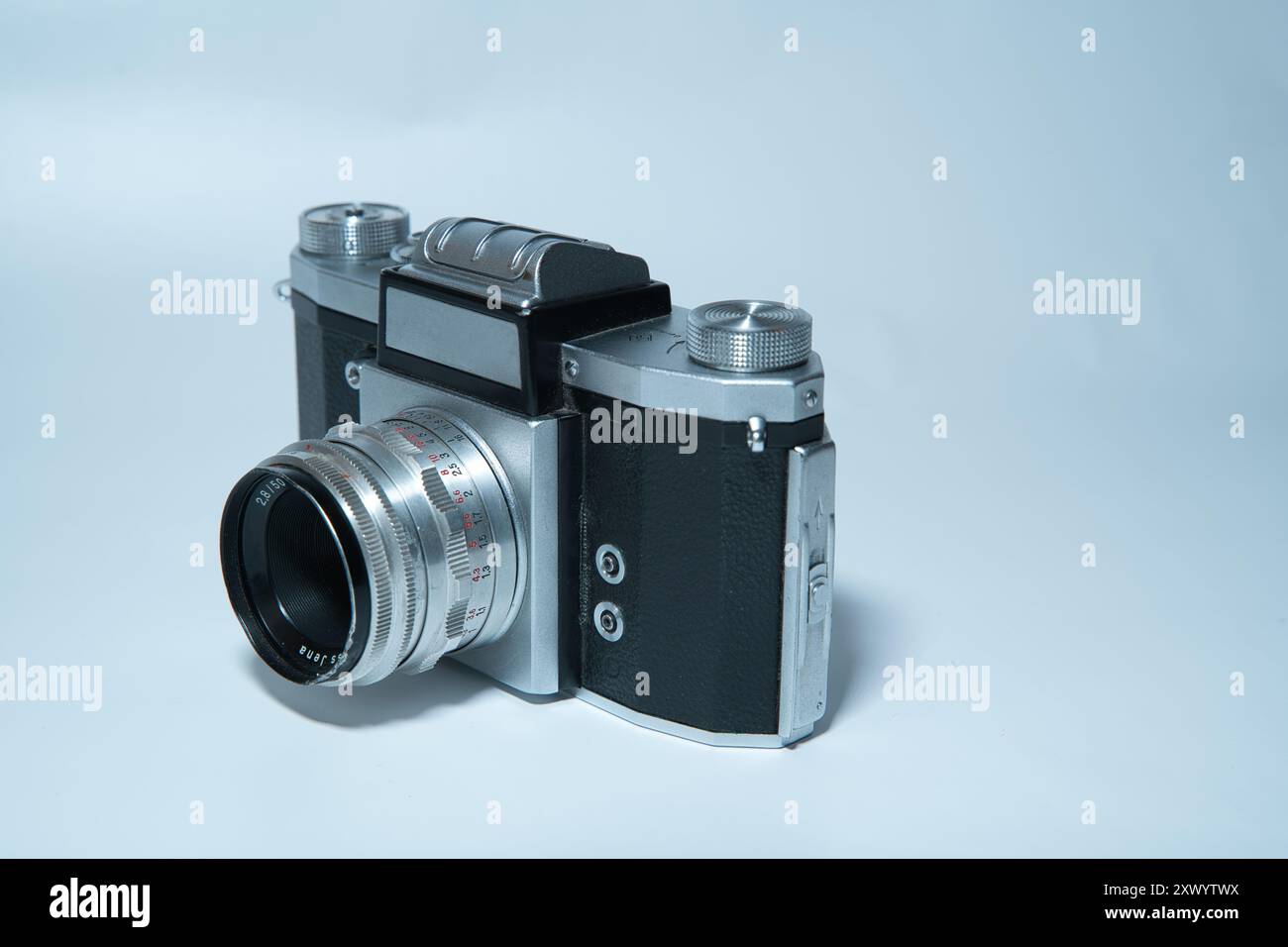 old analog slr camera seen from the side - on white background Stock ...