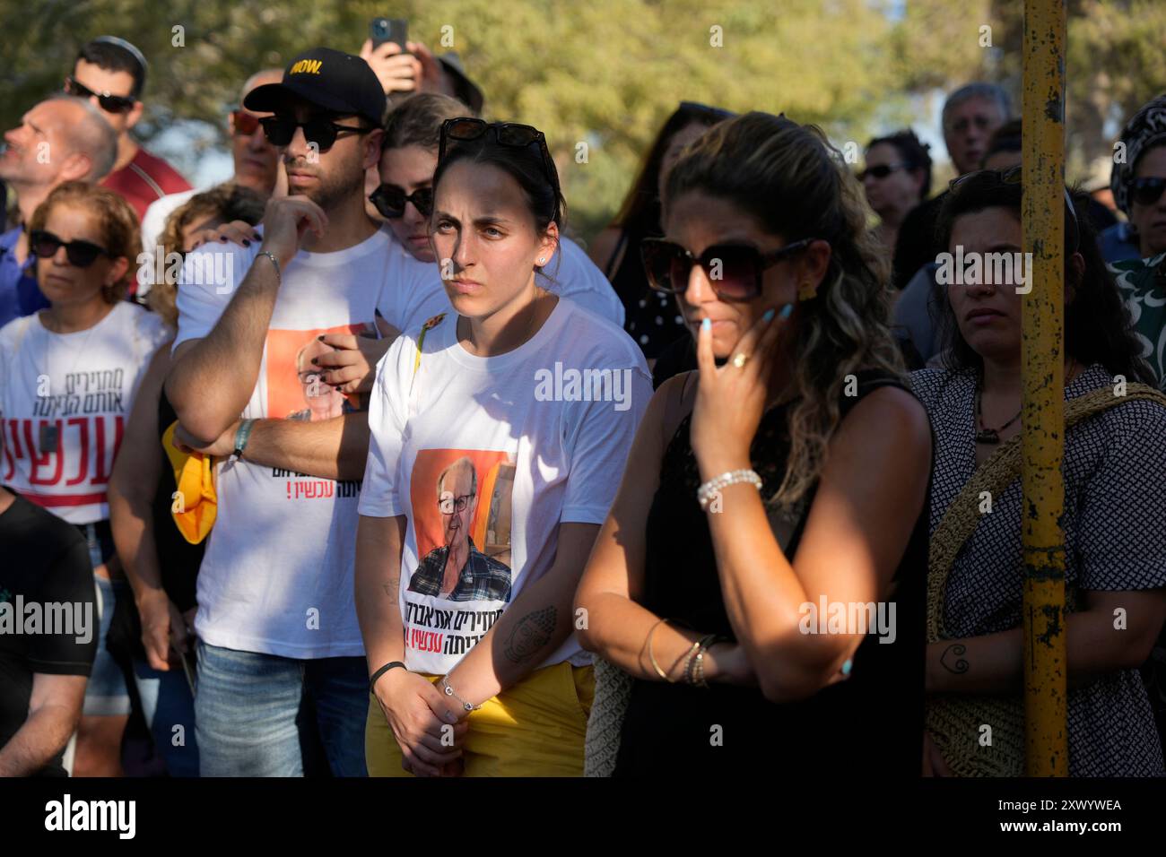 Mourners attend the funeral for slain hostage Avraham Munder, who was ...