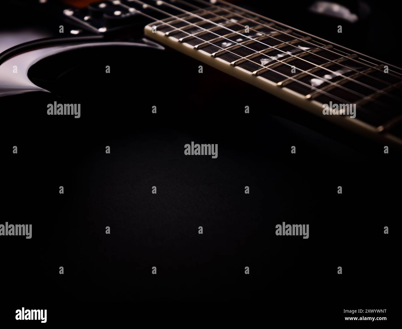 Fretboard of modern electric guitar. Close up Stock Photo - Alamy