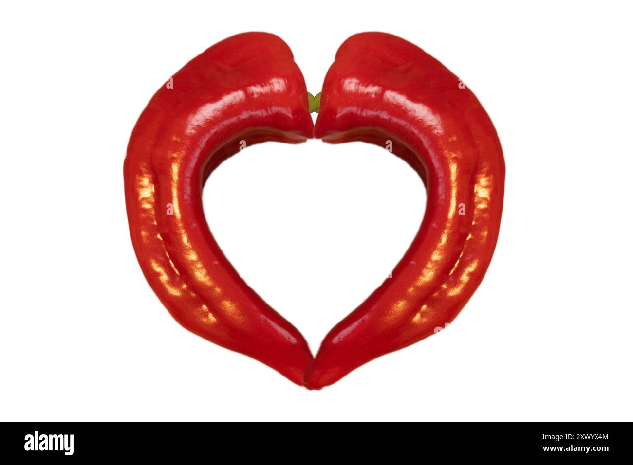 Heart shape made from red peppers on a white background Stock Photo - Alamy