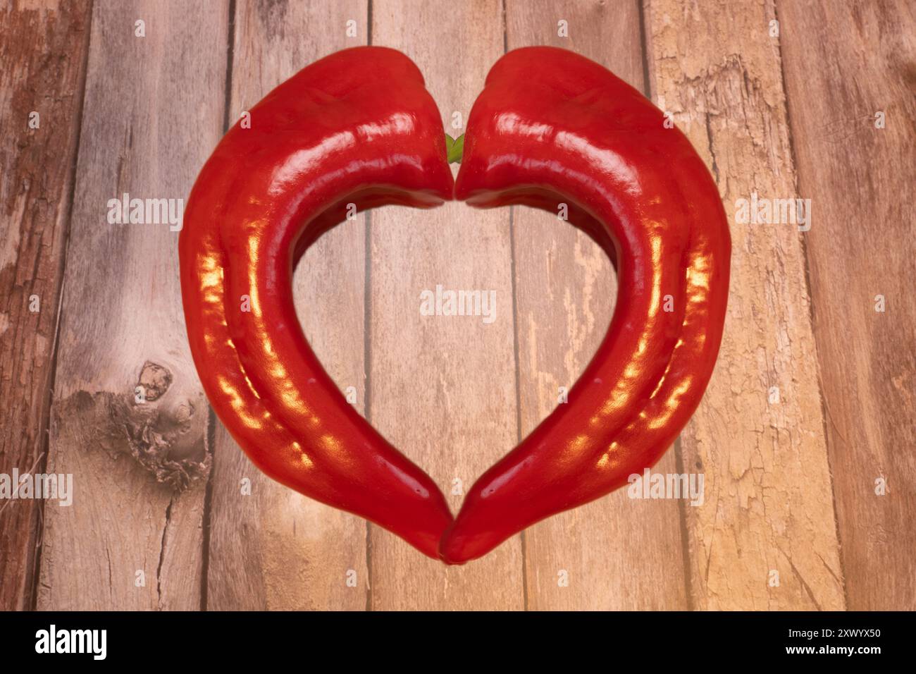 Heart shape made from red peppers Stock Photo - Alamy