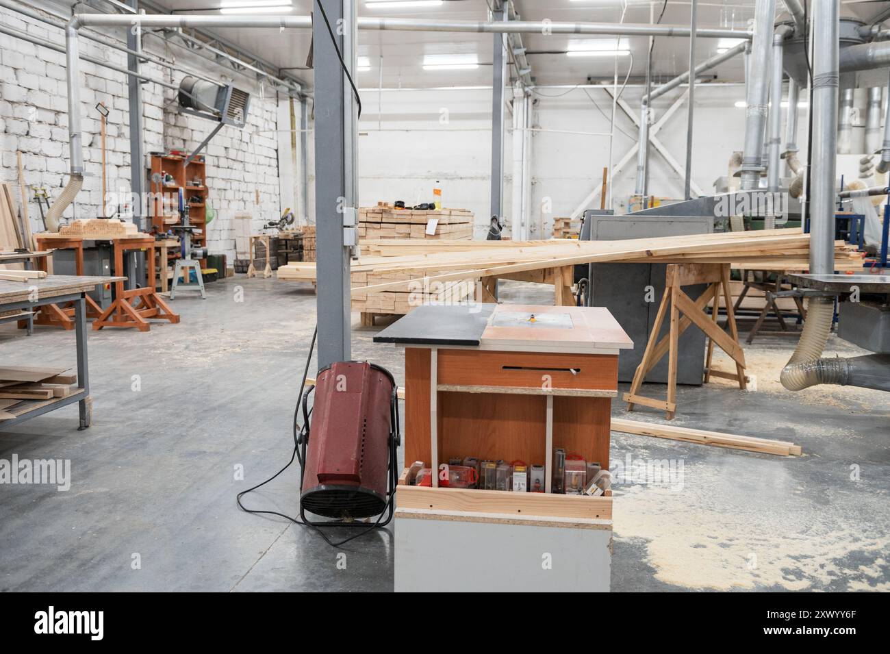 Furniture factory workshop with different wood items Stock Photo - Alamy