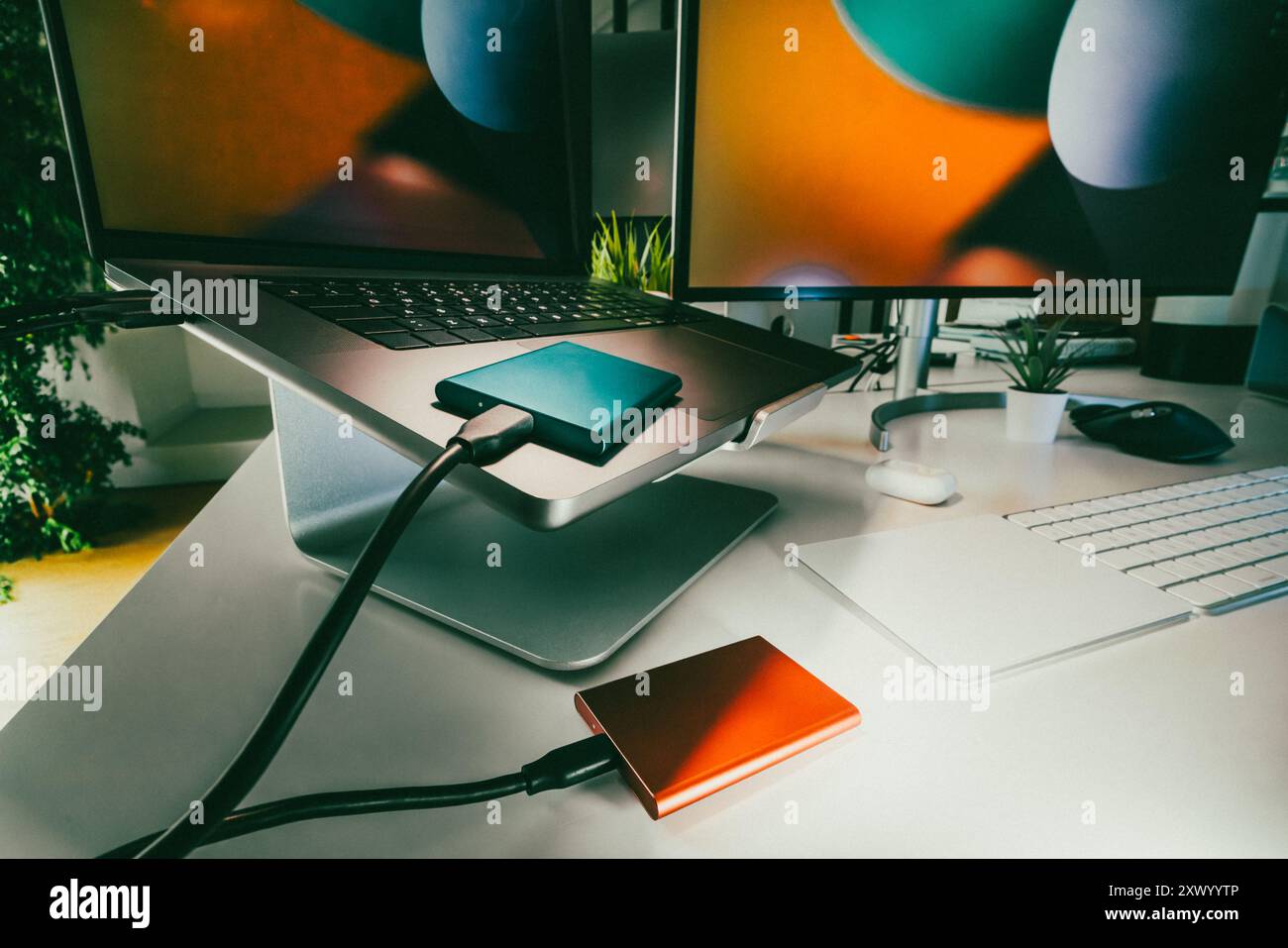 External storage ssd portable disk. Office interior laptop equipment ...