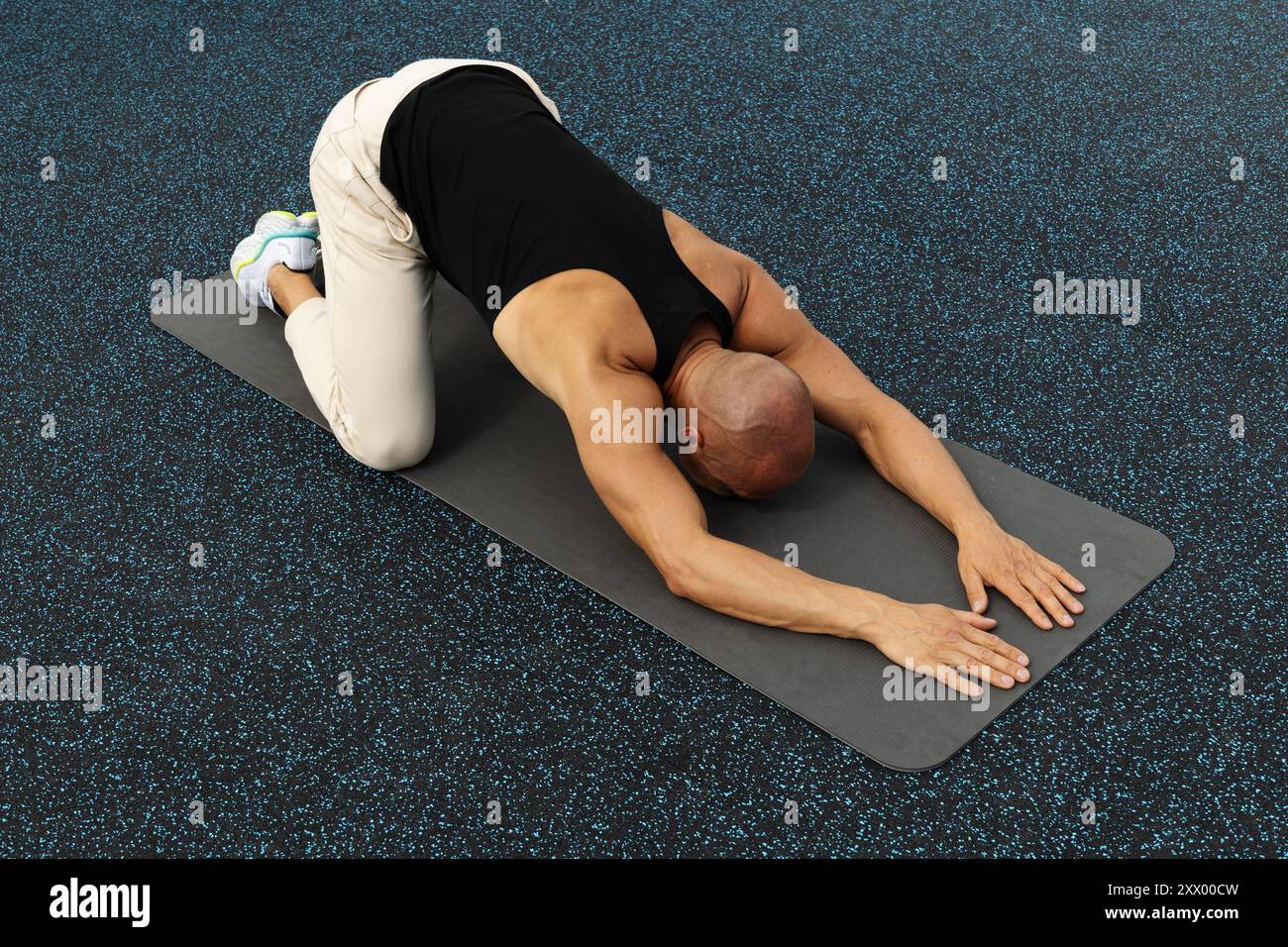 Athlete man exercising and stretching. Yoga practice and outdoor ...