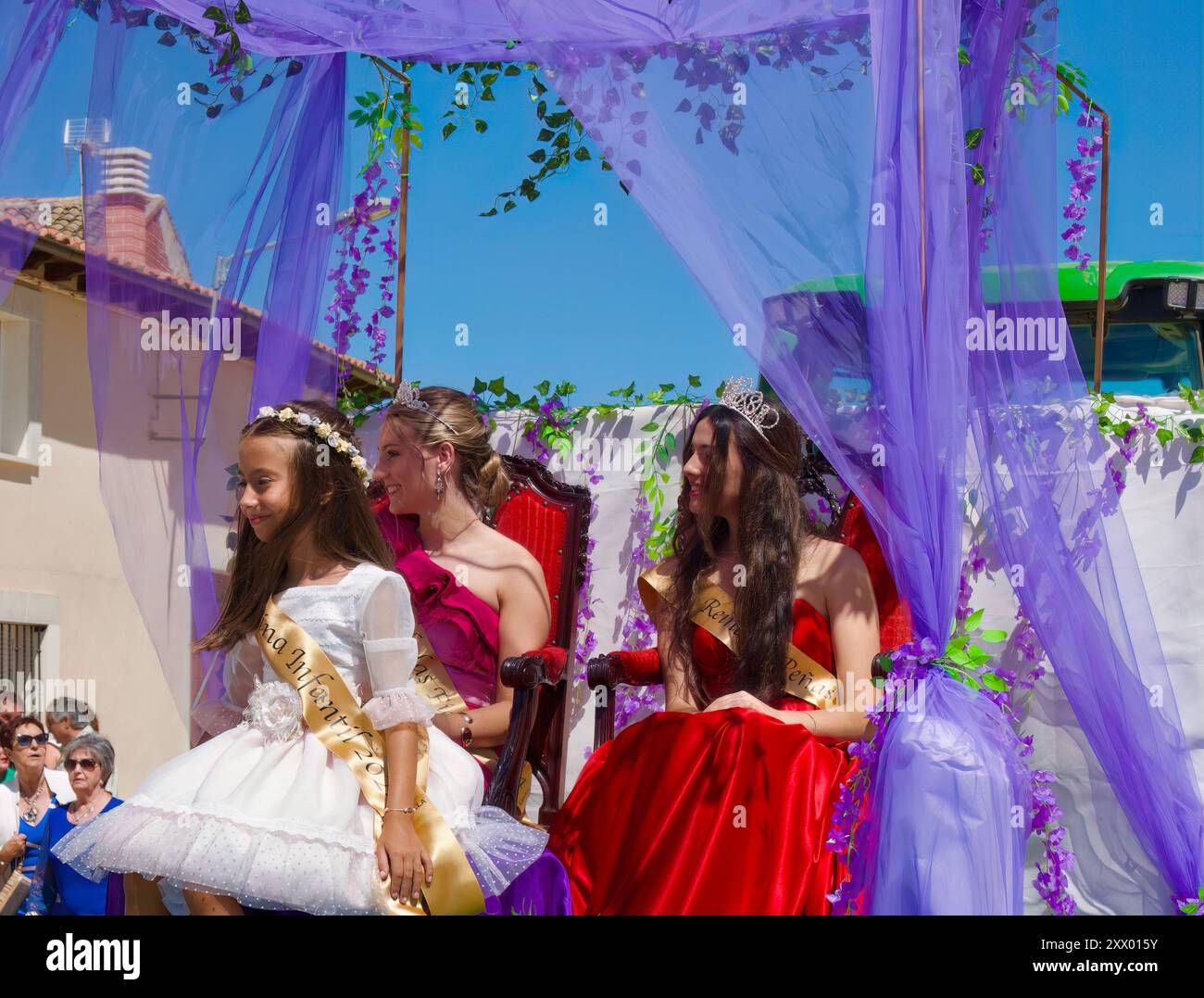 Village party queens on a float during celebrations for the Assumption ...