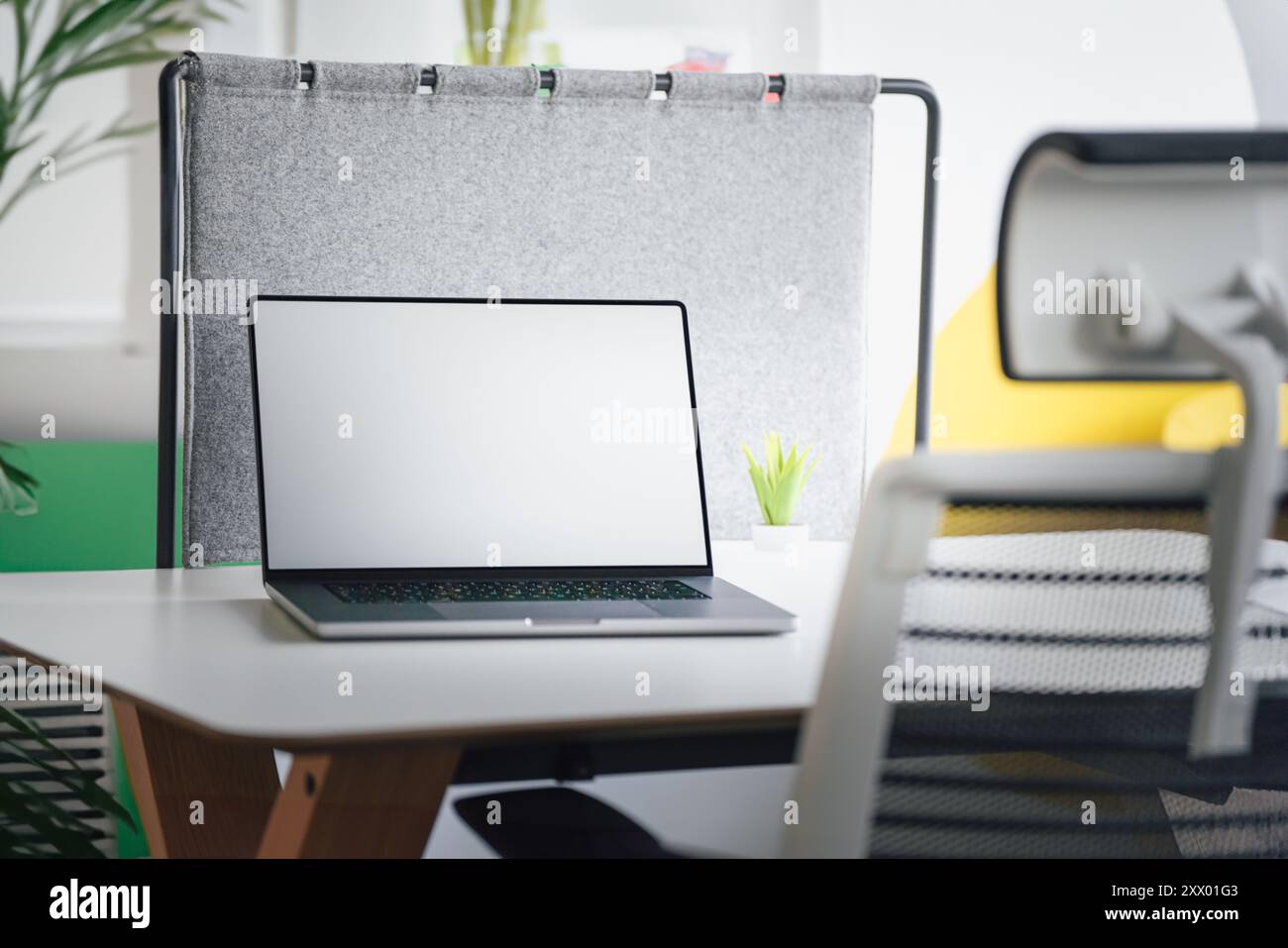 Open laptop. Empty white screen mockup. Office space interior Stock ...