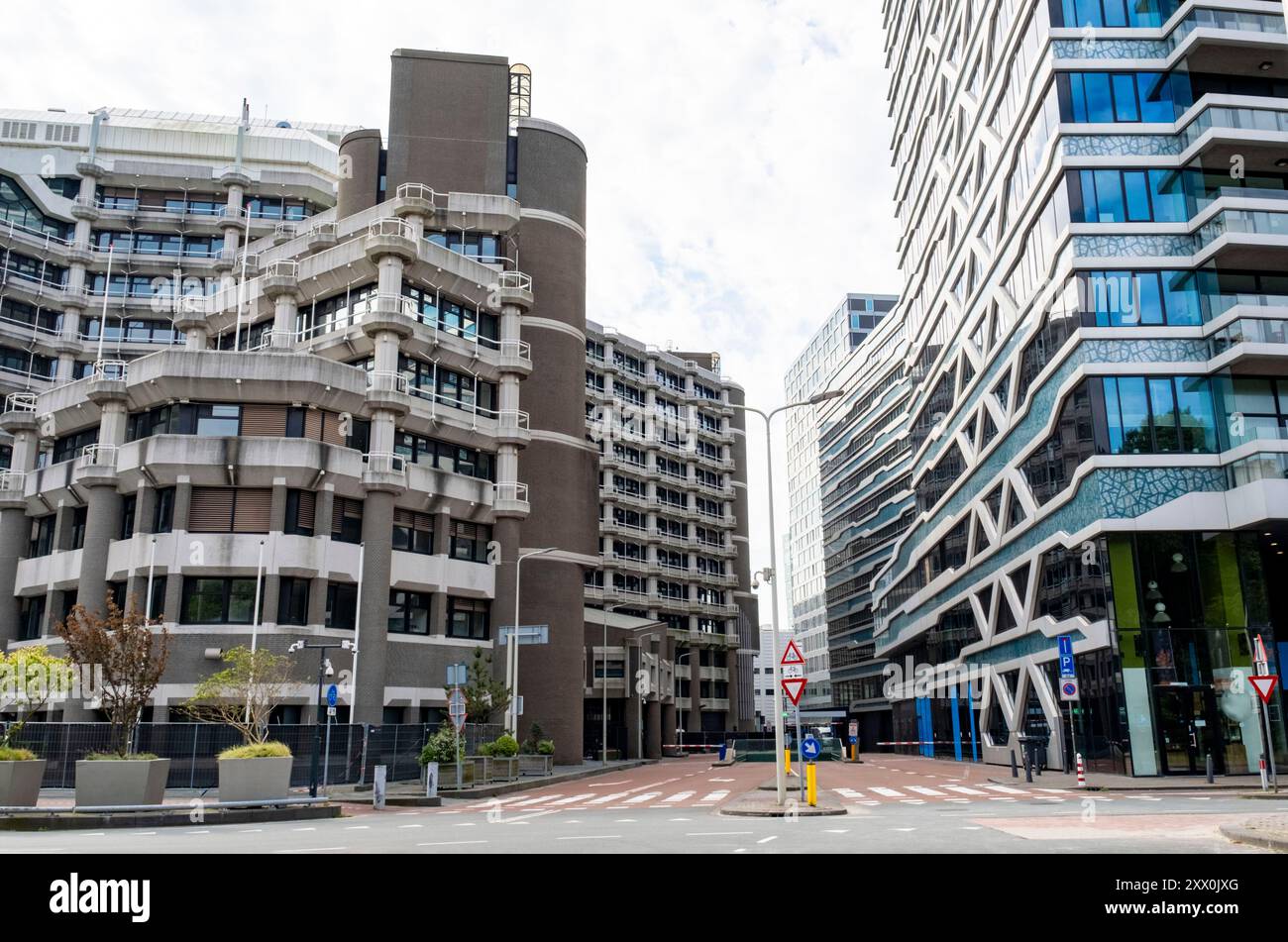 Typical Dutch cityscape on the sunny day with streets, a calm canal ...