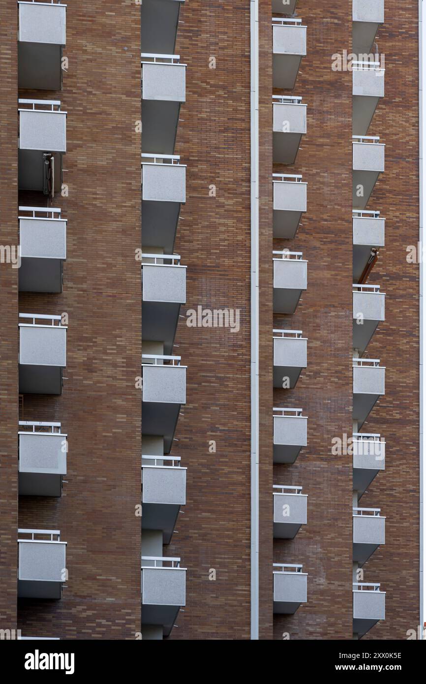 Paris, France - 07 20 2024: View of a red brick building facade with ...