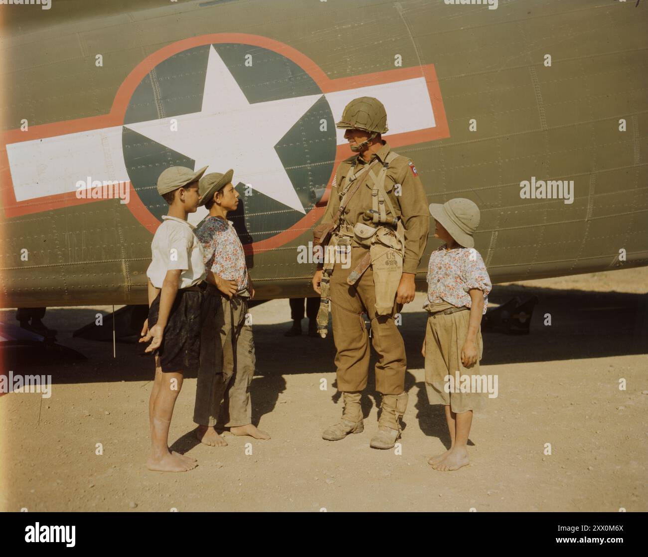 World War II. Airborne Infantryman Talking With Italian Boys Somewhere ...