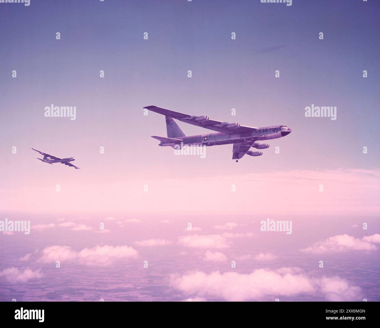 Cold War era. Boeing B-52 and Consolidated Vultee B-36 in Flight. Eglin ...