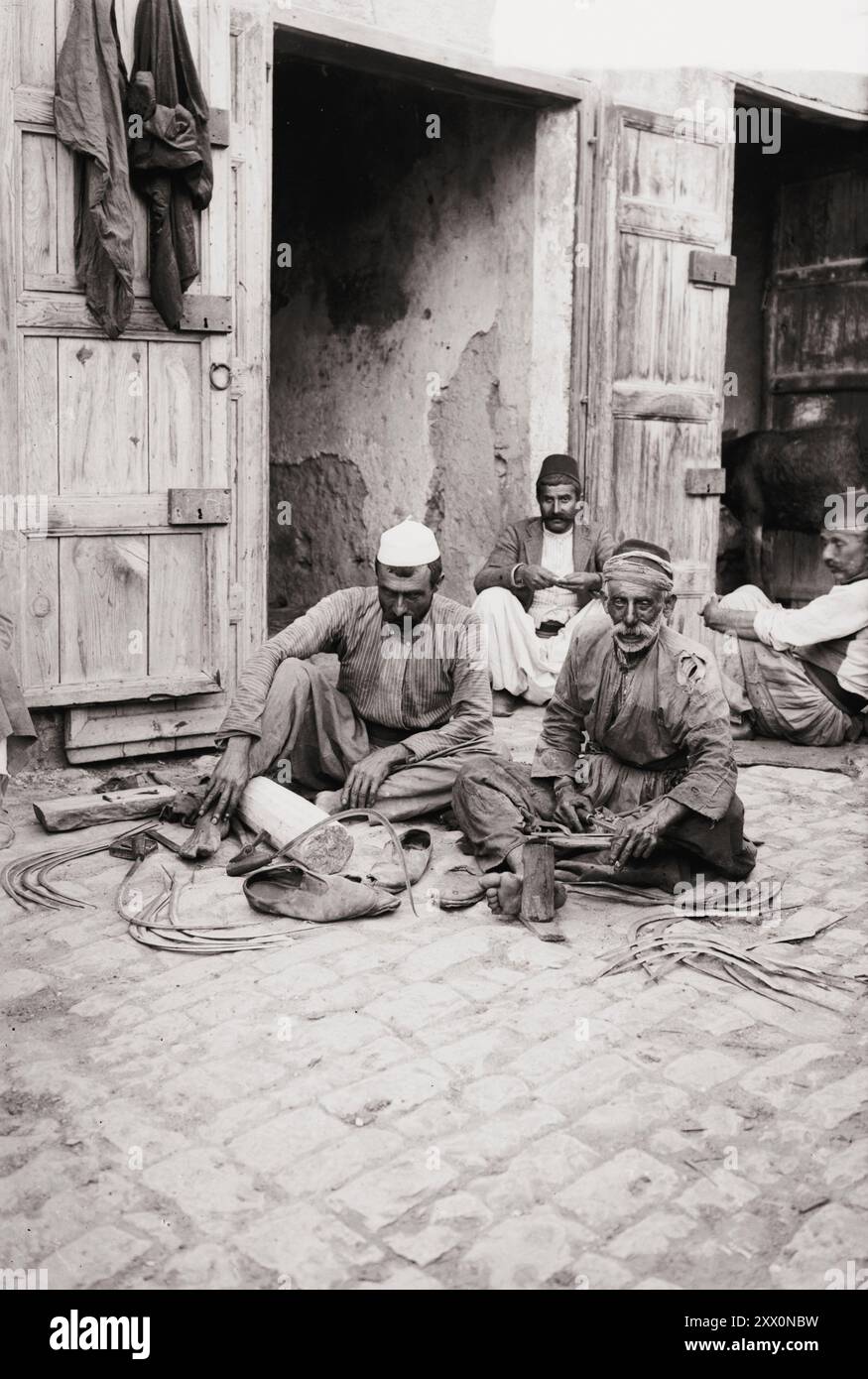 Life in Palestine in the early 20th century. Sharpening sickles ...