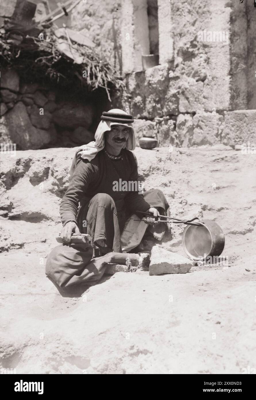Life in Palestine in the early 20th century. Tinning a kettle. Historic ...