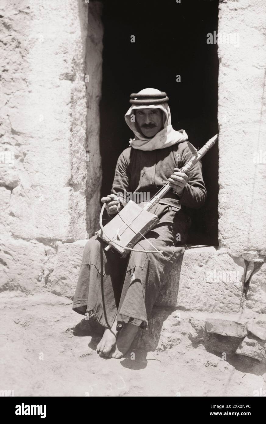 Life in Palestine in the early 20th century. Playing the Rababeh ...