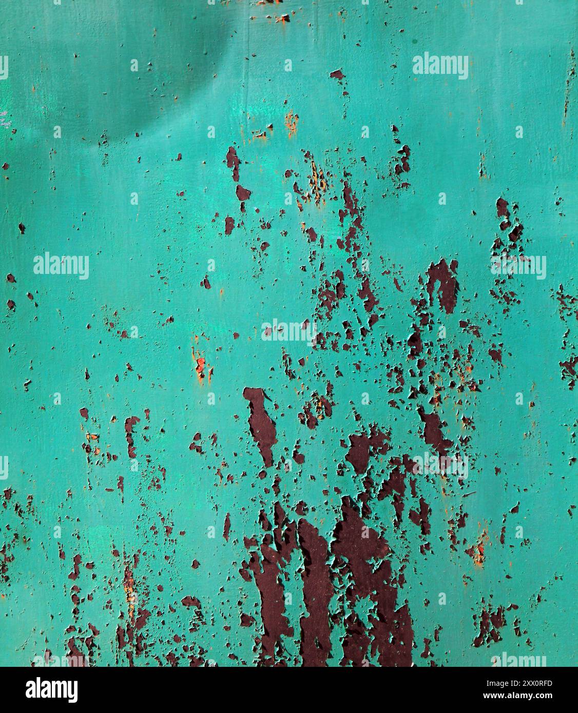 Light-green metallic wall, background. Ancient, mangy surface with ...