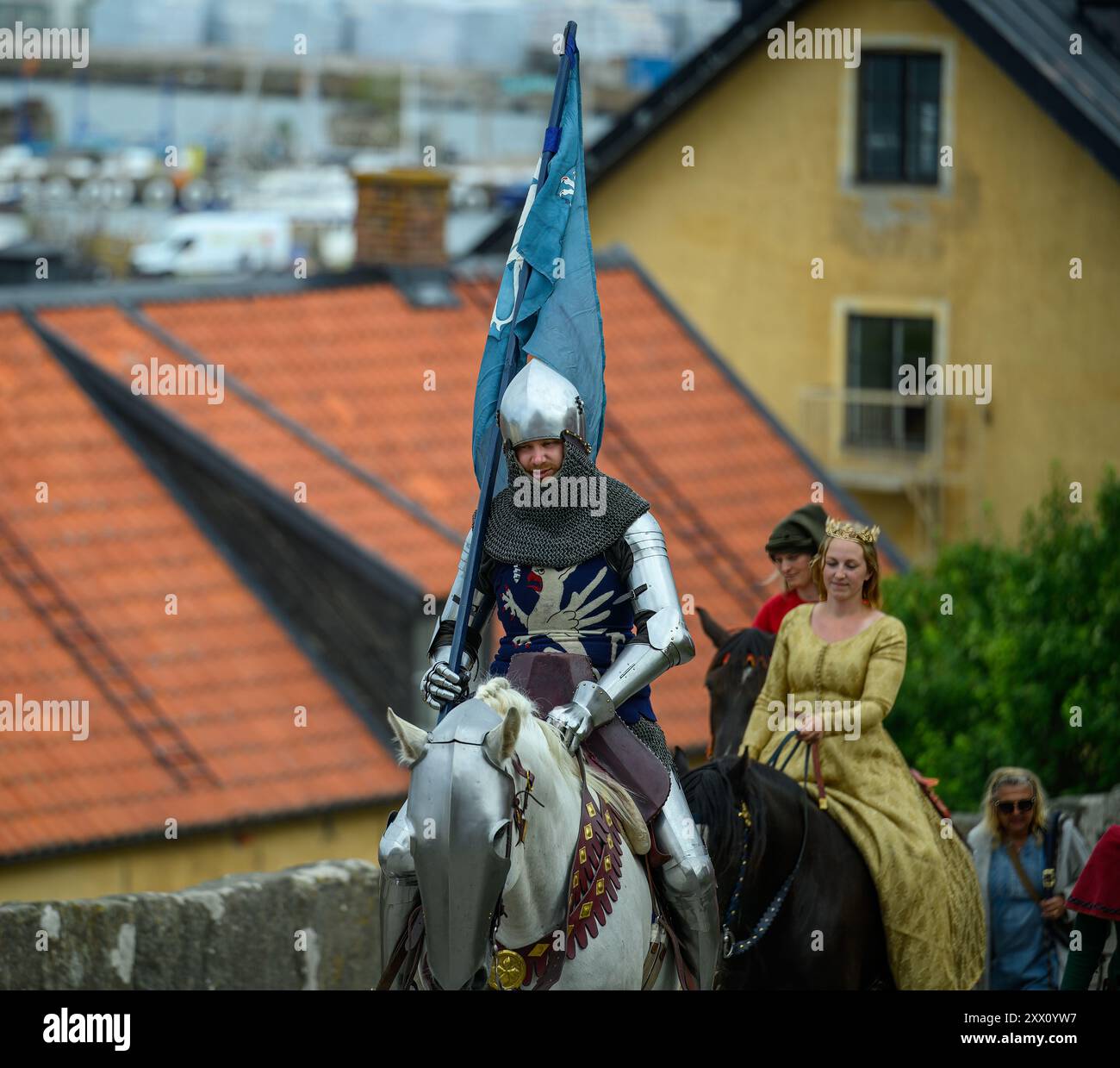 Medieval day, knight and queen on horse Stock Photo - Alamy