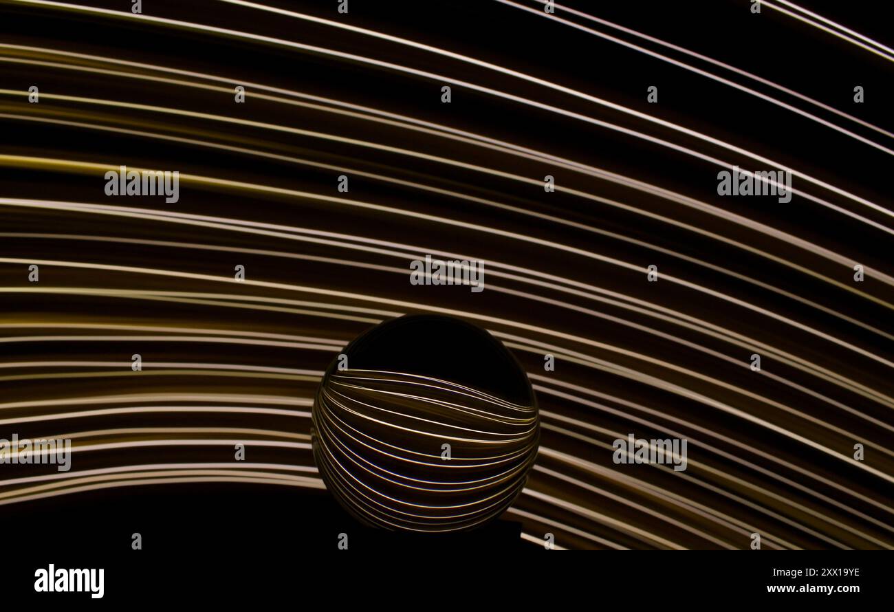 A long exposure photograph. Light painting photography - swirly waves ...