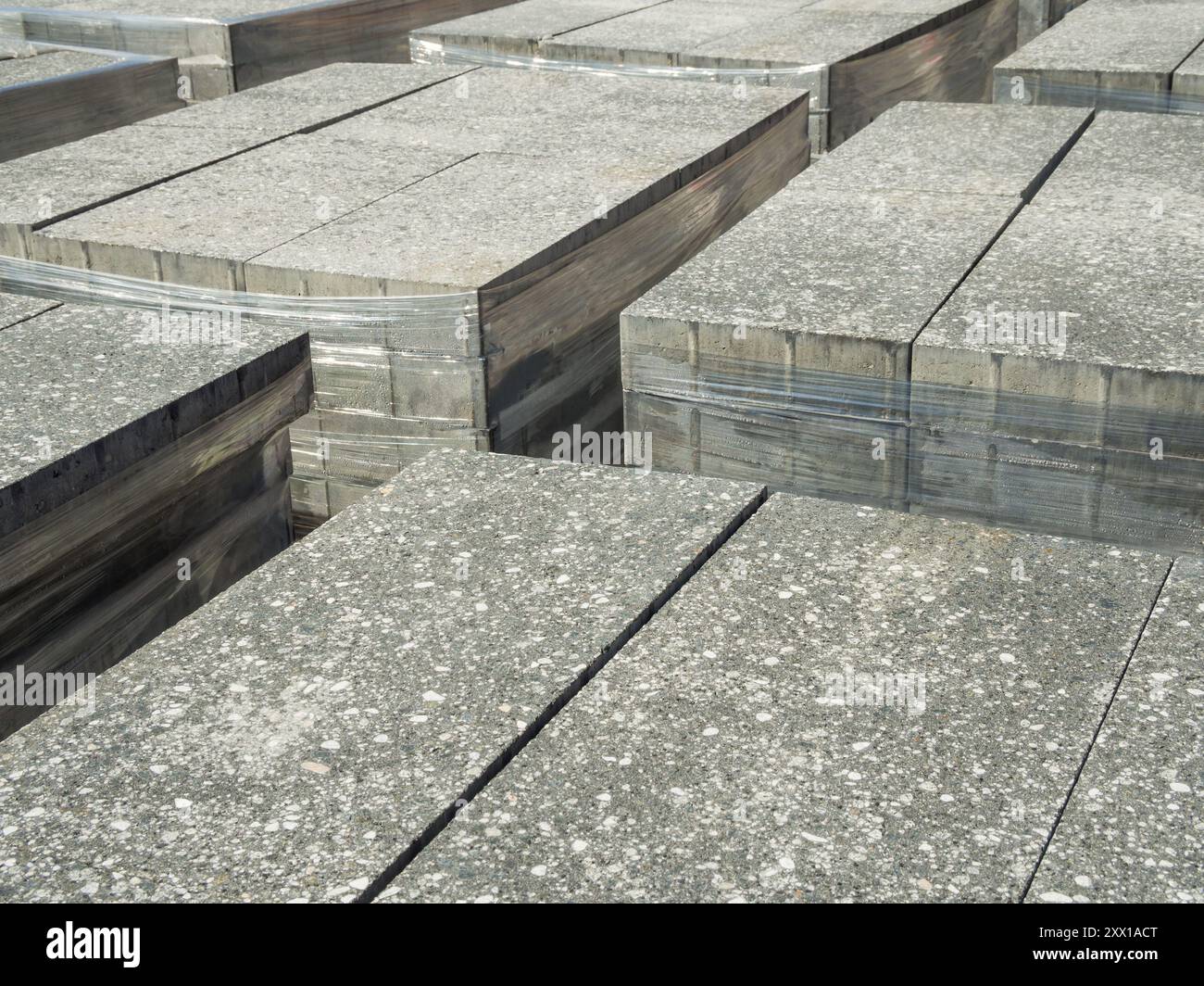 Packages with large-format tiles for laying paving surfaces Stock Photo ...