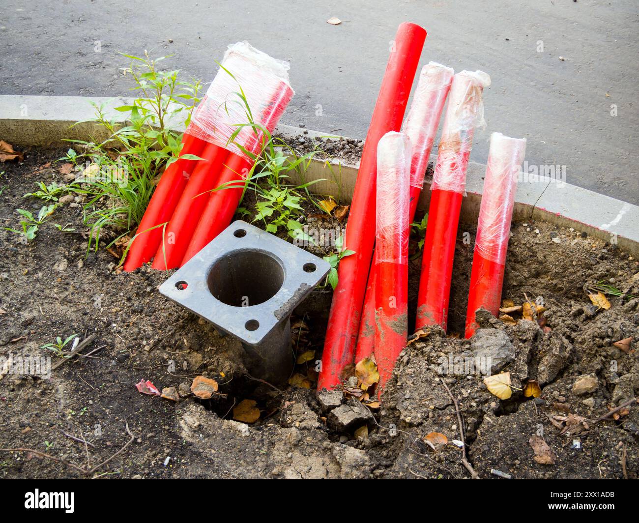 Preparing to install a lamp post Stock Photo - Alamy