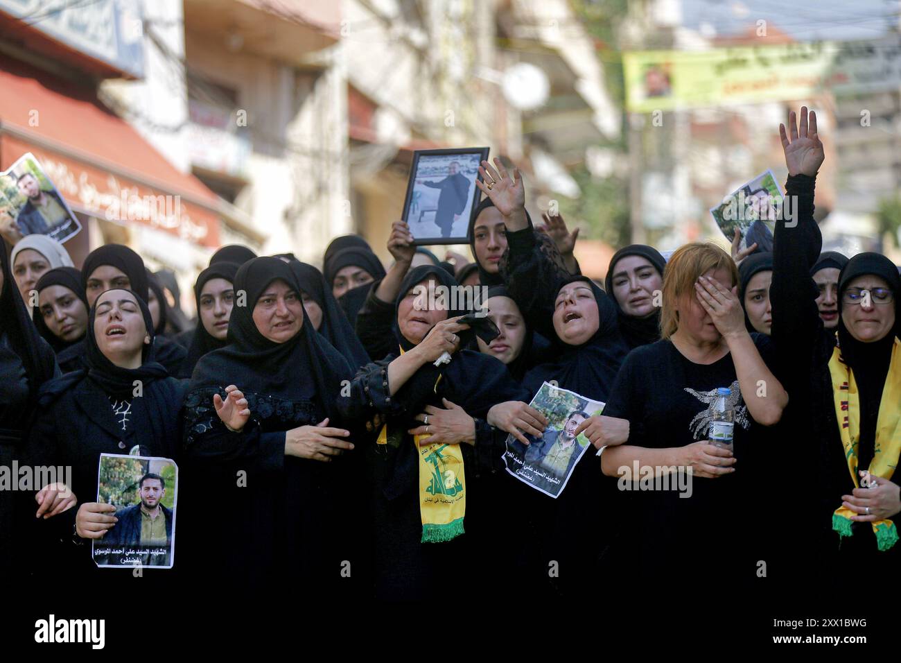 Nabi Sheet, Lebanon. 21st Aug, 2024. Lebanese women mourn during the ...