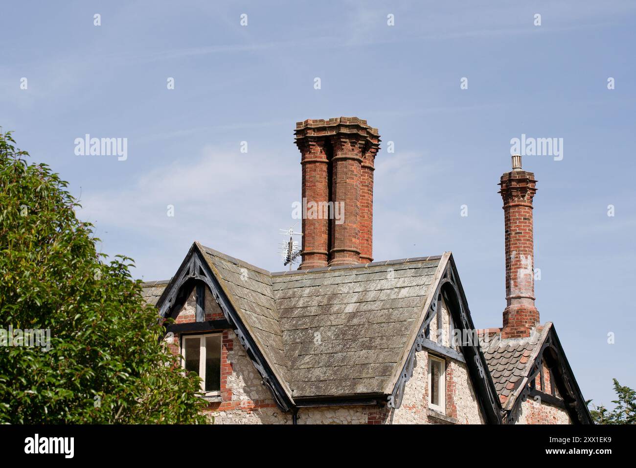 Tall Victorian brick house chimney Stock Photo - Alamy