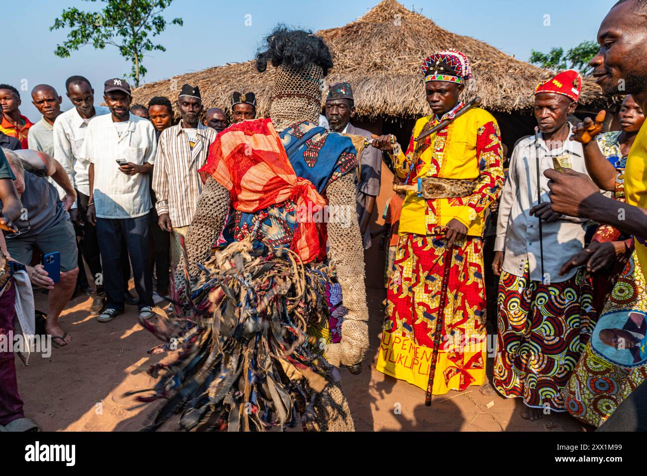 Traditional masked man dancing, Tshikapa, Kasai, Democratic Republic of ...