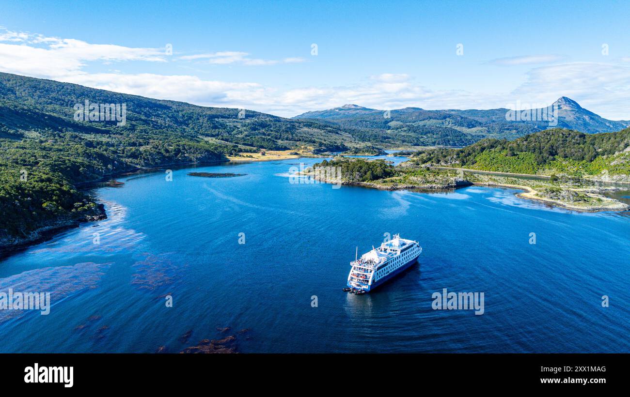 Aerial of a cruise ship anchoring in Wulaia Bay, Tierra del Fuego ...